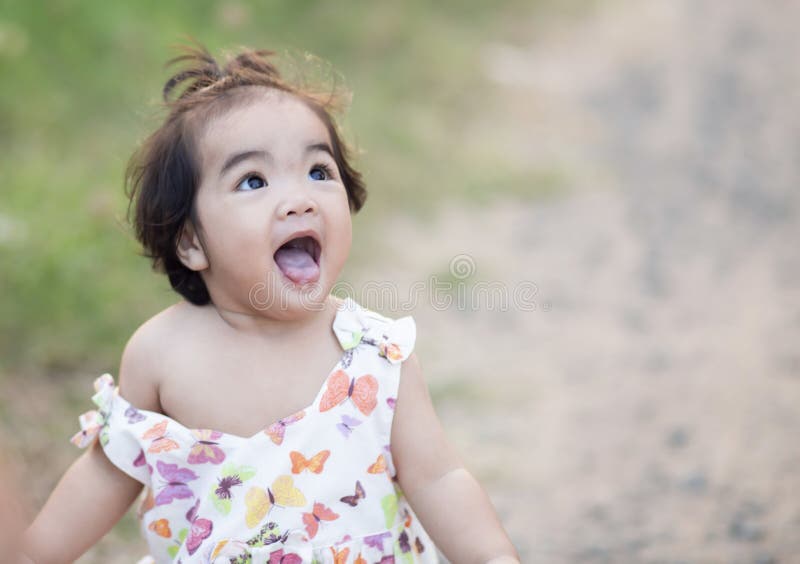 Cute Girl Smiling Brightly in the Setting Sun Stock Image - Image of ...