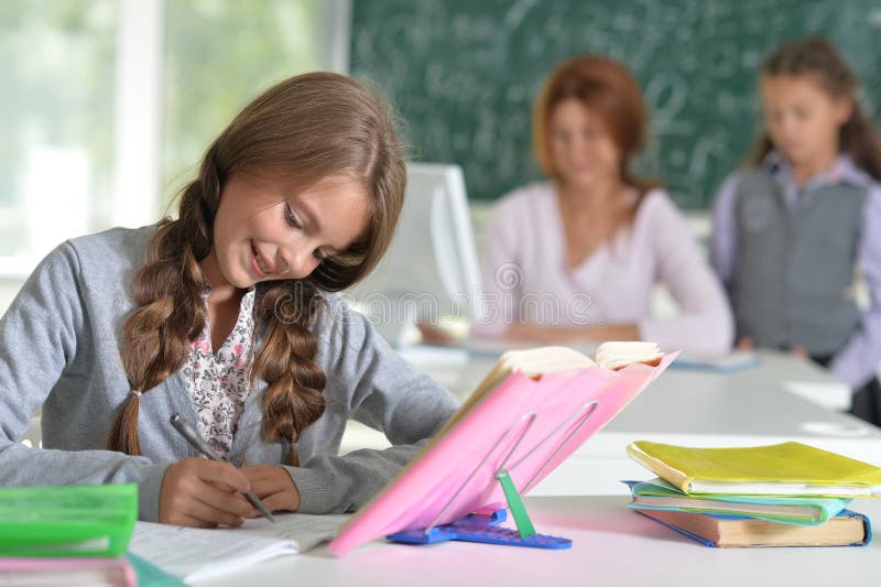 Cute Girl Studying in the Class Room Stock Photo - Image of positive ...