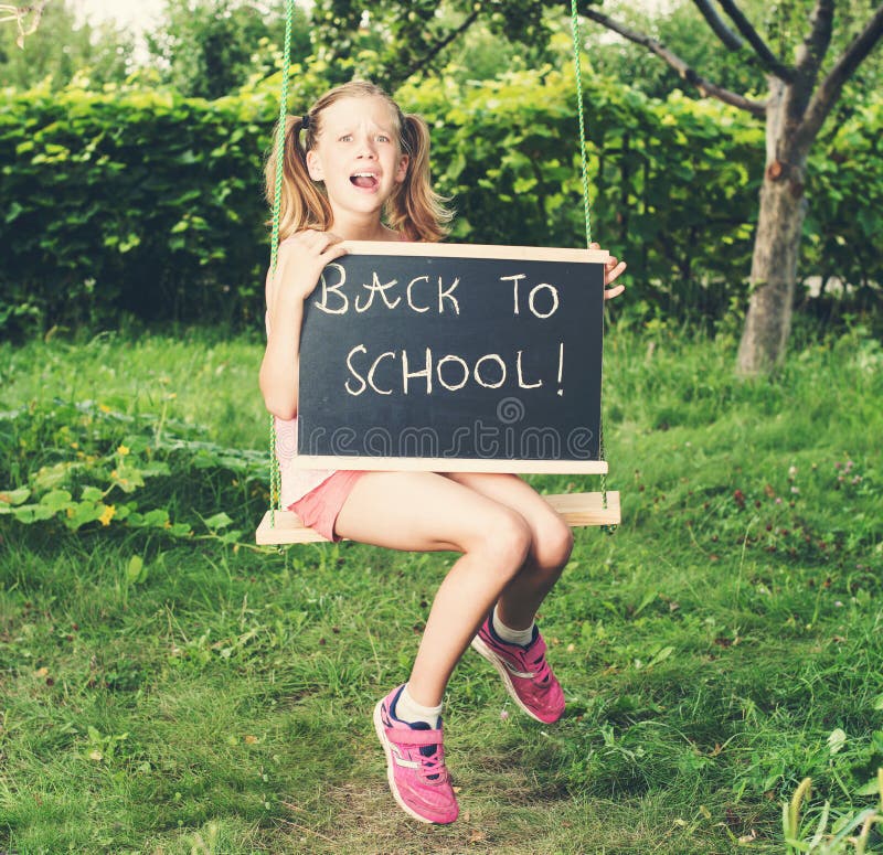 Cute Girl on the Swing Feeling Unhappy Scared about Going Back T Stock ...
