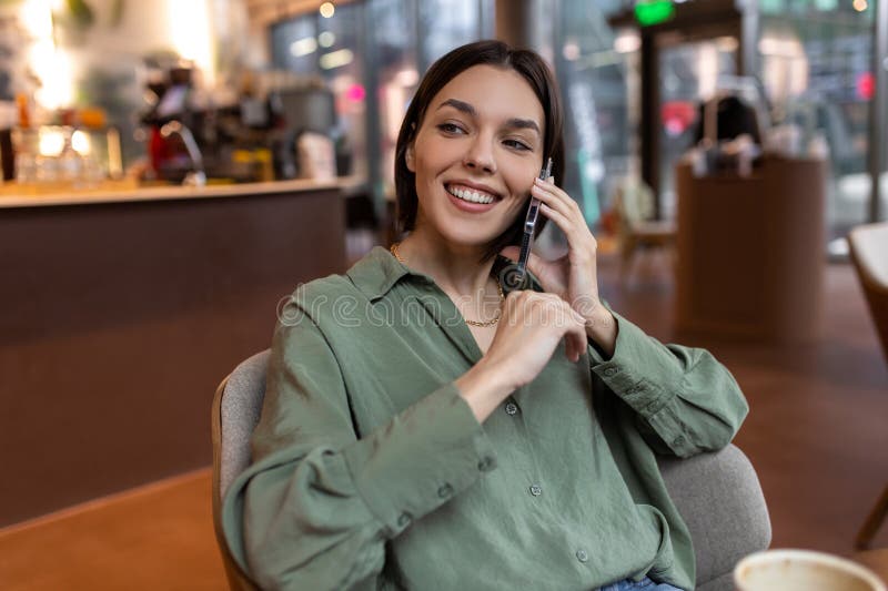 Cute Girl Talking on the Phone and Looking Contented Stock Image ...