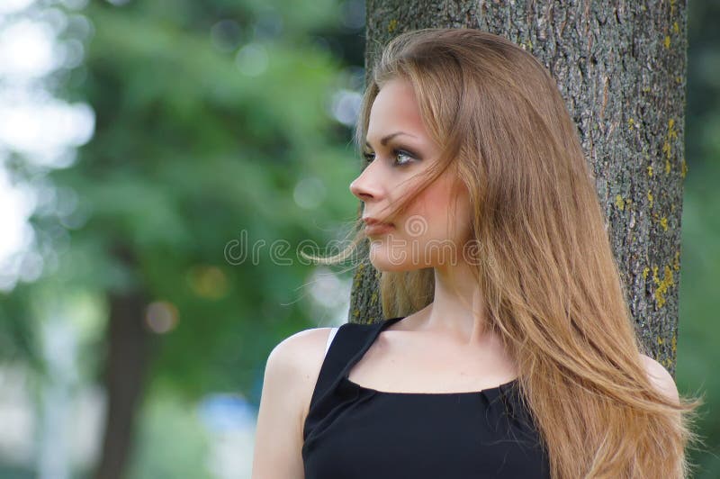 Cute girl at tree stock image. Image of pleasure, friendship - 20430103