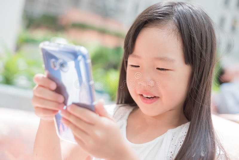 Cute girl use phone stock photo. Image of girl, lifestyle - 107312346