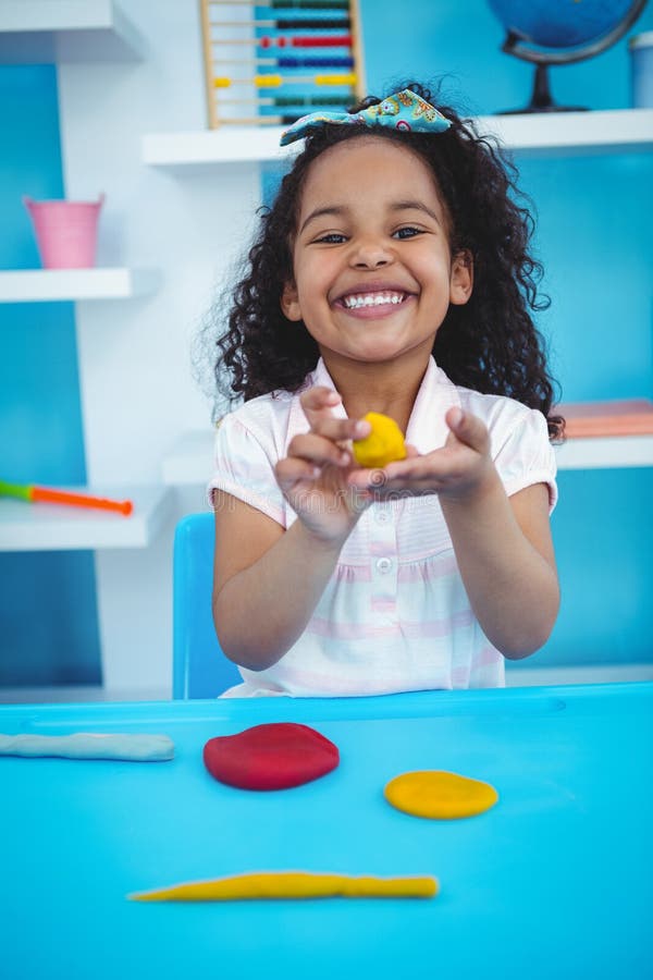 Cute Girl Using Modeling Clay Stock Image - Image of childhood, colors ...