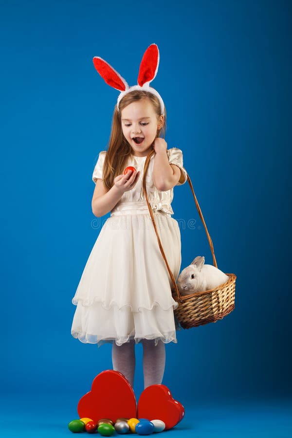 Cute Girl with White Rabbit in Basket with Easter Eggs Stock Photo ...