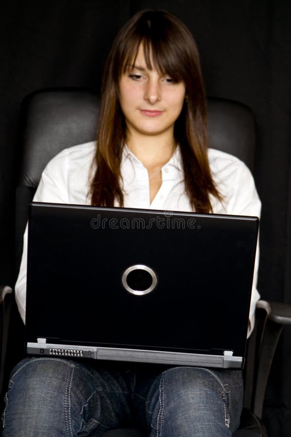 Cute Girl Working on Laptop. Stock Photo - Image of looks, performs ...