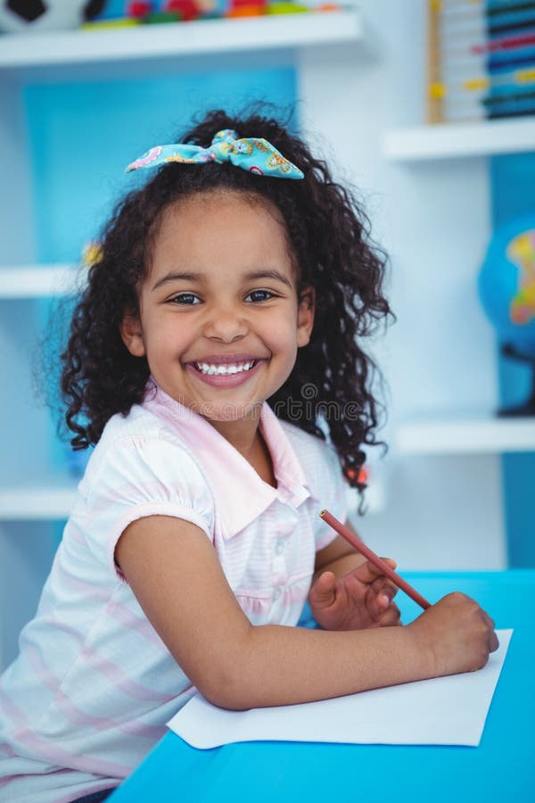 Cute Girl Writing on Notebook Stock Image - Image of happy, beautiful ...