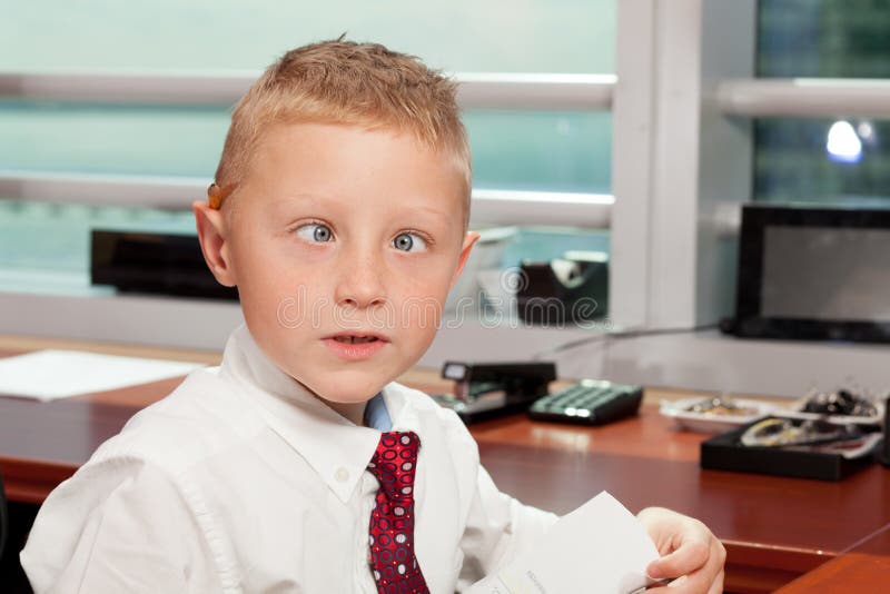 Cute goofy boy in office stock photo. Image of mischievous - 21353950