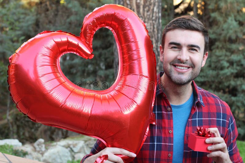 Cute Guy Proposing with Heart Balloon Stock Image - Image of balloon ...