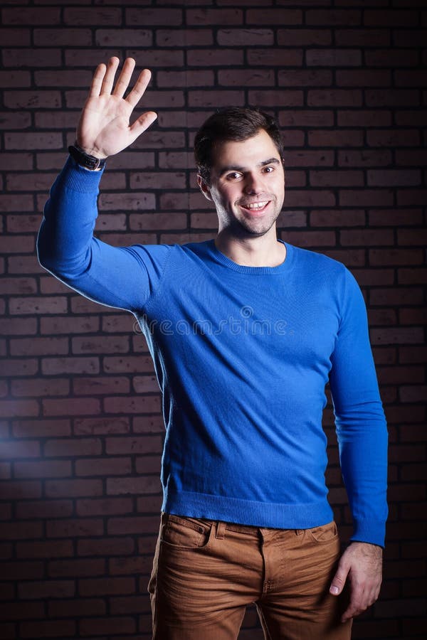 Cute Guy Waves His Hand Greeting Stock Photos - Free & Royalty-Free ...