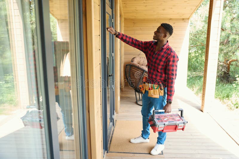 Cute Guy with Work Tools is Knocking on the Door Stock Photo - Image of ...