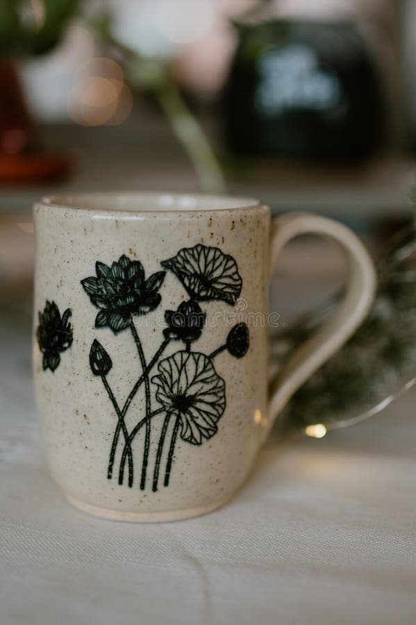 Cute Hand-made Mug with Plants Painted on it Stock Photo - Image of ...