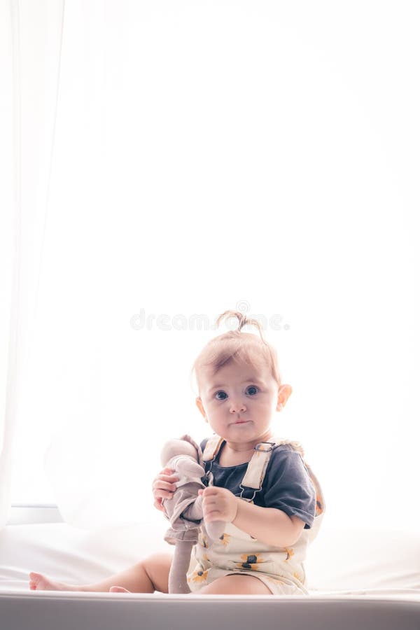 Cute Happy Baby Playing on White Bed in Sunny Room Stock Image - Image ...