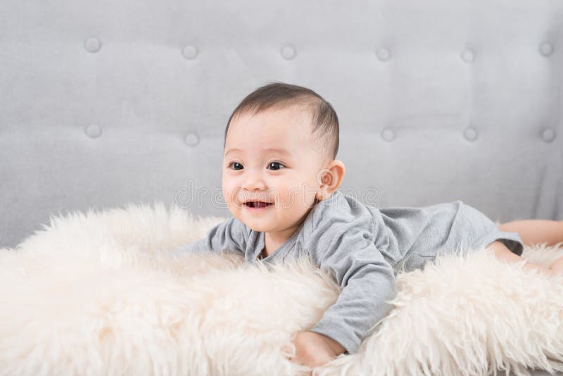 Cute Happy Baby Portrait Lying on Fur Stock Image - Image of vietnamese ...