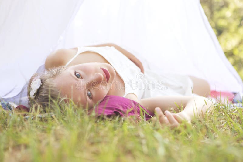 Cute Happy Caucasian Woman With Short Haircut In White Dress In Stock