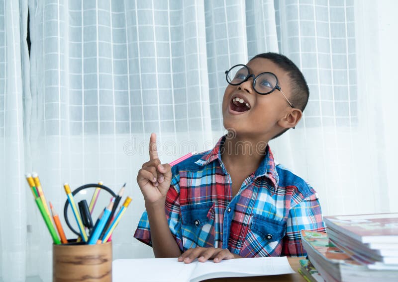 Cute Asian Happy Little Boy Getting an Idea Stock Photo - Image of ...