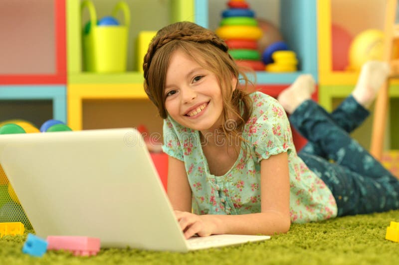 Cute and Happy Little Girl Children Using Laptop Computer Stock Image ...