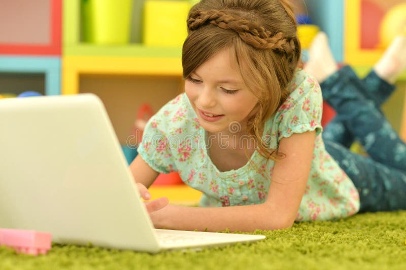 Cute and Happy Little Girl Children Using Laptop Computer Stock Photo ...
