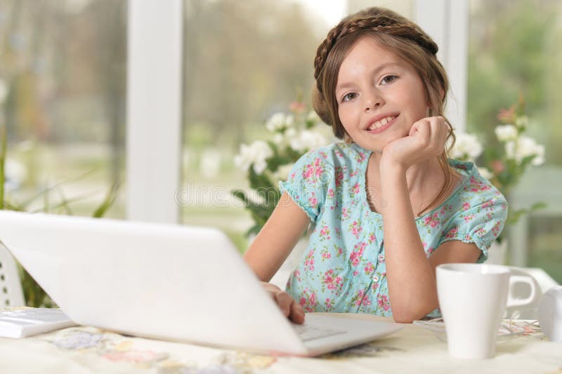 Cute and Happy Little Girl Children Using Laptop Computer Stock Photo ...