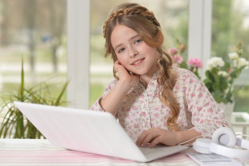 Cute and Happy Little Girl Children Using Laptop Computer Stock Photo ...
