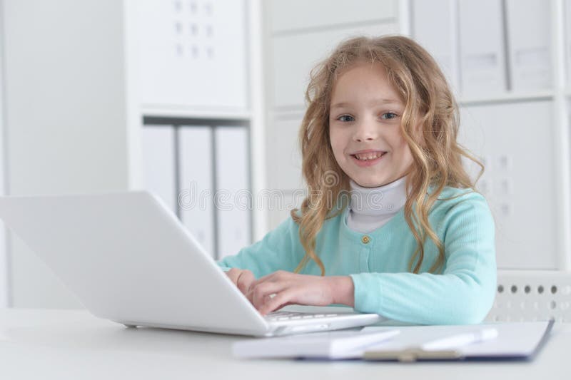 Cute and Happy Little Girl Children Using Laptop Computer Stock Photo ...