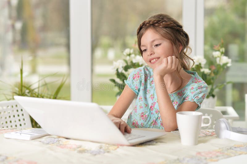 Cute and Happy Little Girl Children Using Laptop Computer Stock Photo ...