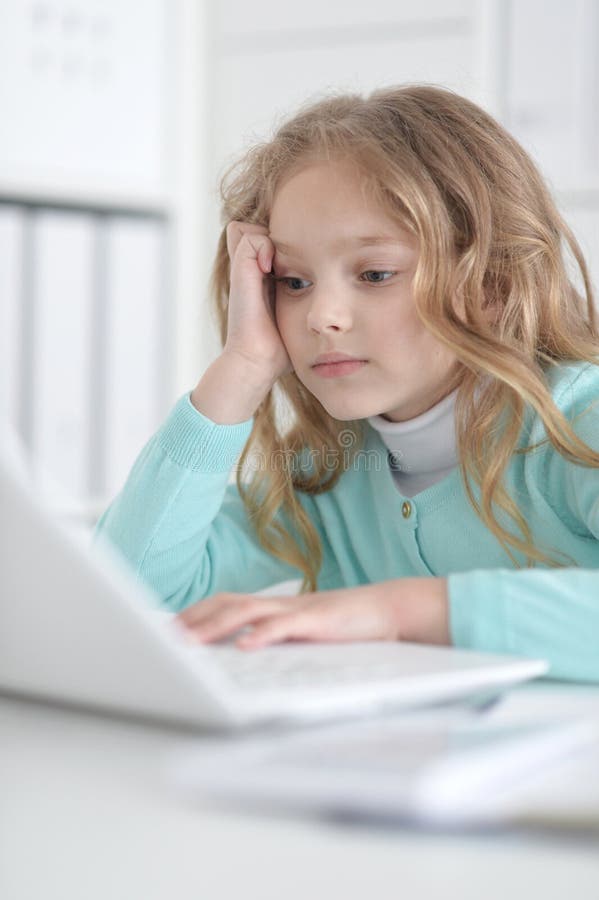 Cute and Happy Little Girl Children Using Laptop Computer Stock Photo ...
