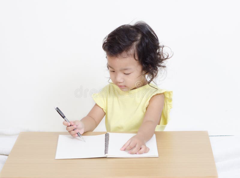 Cute Happy Little Girl Writing Something Stock Image - Image of people ...