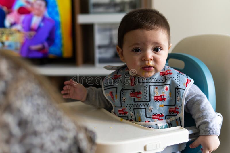 Cute Hispanic Child on a Baby Walker Stock Photo - Image of child ...
