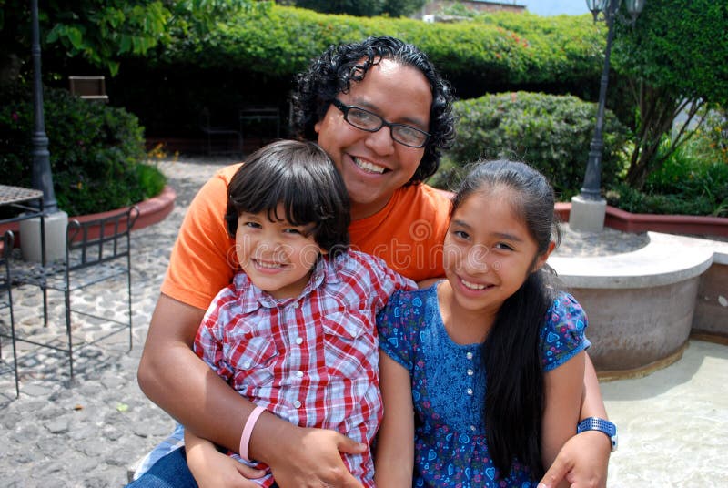 Cute Hispanic family stock photo. Image of hair, love - 20105452
