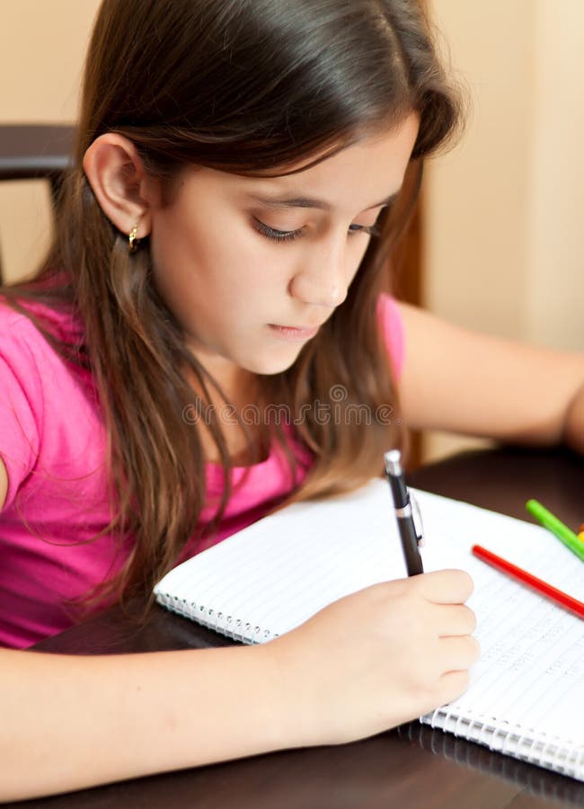 Cute Hispanic Girl Writing at School Stock Image - Image of education ...