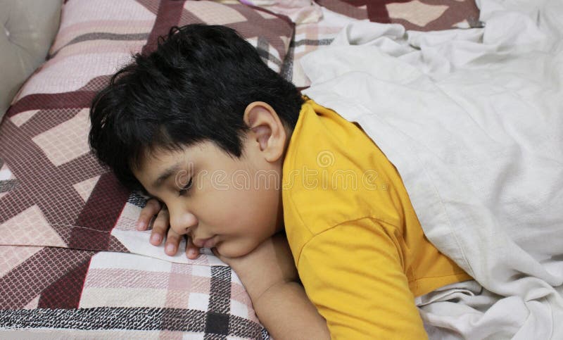 Cute Indian child sleeping stock photo. Image of little - 223095930