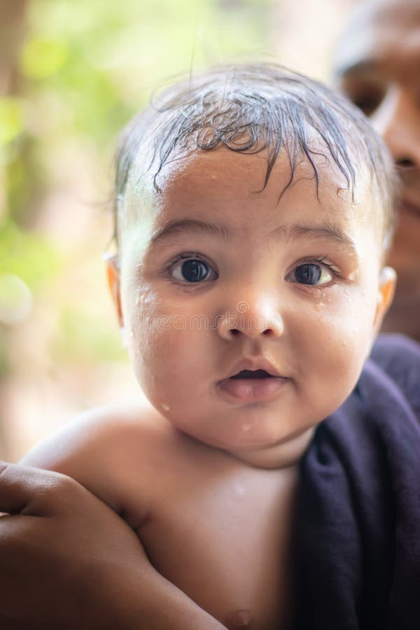 Cute Infant Facial Expressing after Bathing from Flat Angle Indoor Shot ...
