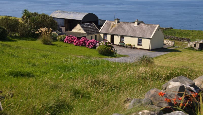 Cute Irish Cottage by the Ocean for Rental Stock Photo - Image of ...