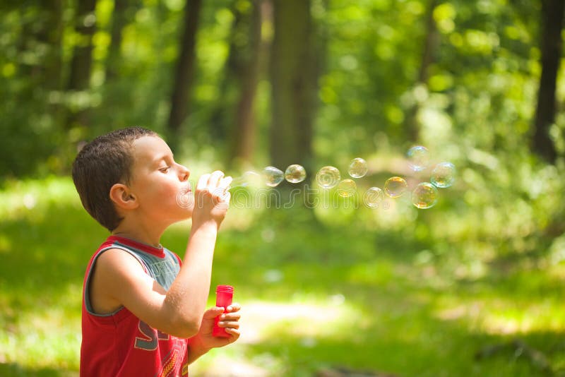 Cute Kid Blowing Soap Bubbles Stock Photo - Image of design, outdoors ... Cute Kid Blowing Soap Bubbles Stock Photo - Image of design, outdoors ...
