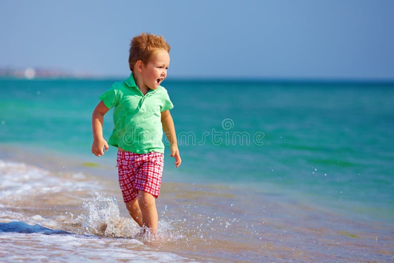 Cute Kid Boy Having Fun on the Sea Beach Stock Photo - Image of ...