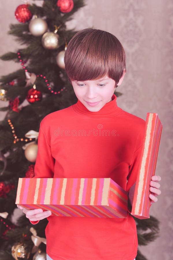 Cute Kid Boy Open Christmas Gift in Room Stock Photo - Image of room ...