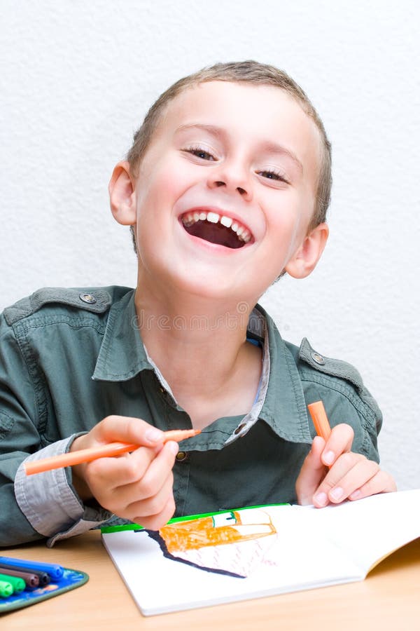 Little boy drawing stock photo. Image of playful, crayons - 4505404