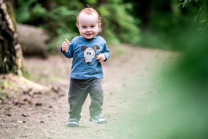 Cute Kid Eating Bread Outdoors Stock Image - Image of lifestyle, leaves ...