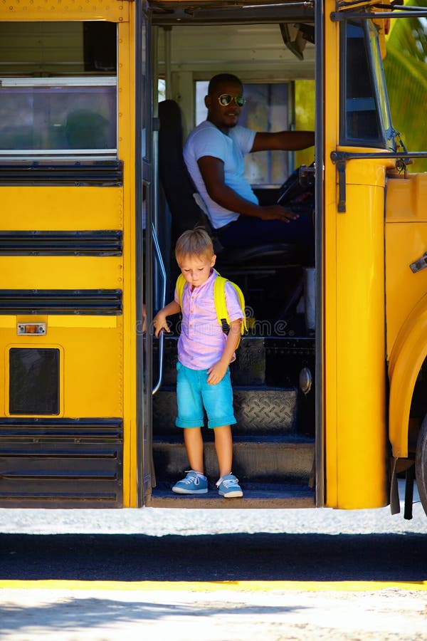 Cute Kid is Getting on the Bus, Ready To Go To School Stock Image ...