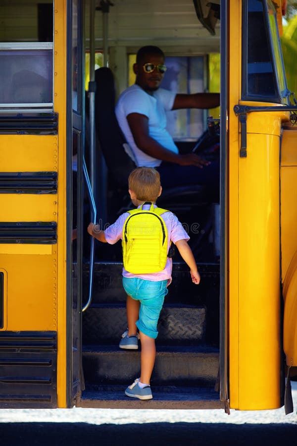 Cute Kid is Getting on the Bus, Ready To Go To School Stock Photo ...