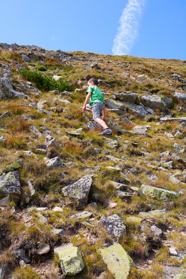 Cute kid on mountain stock image. Image of climbing, brave - 15945921