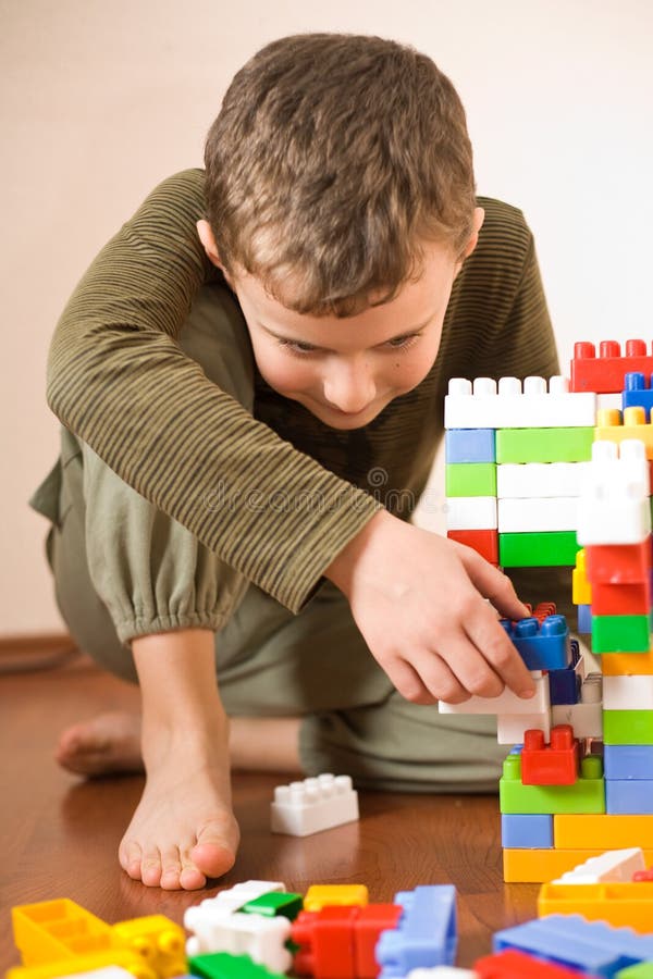 Cute Kid Playing with Cubes Stock Image - Image of hand, color: 8130715