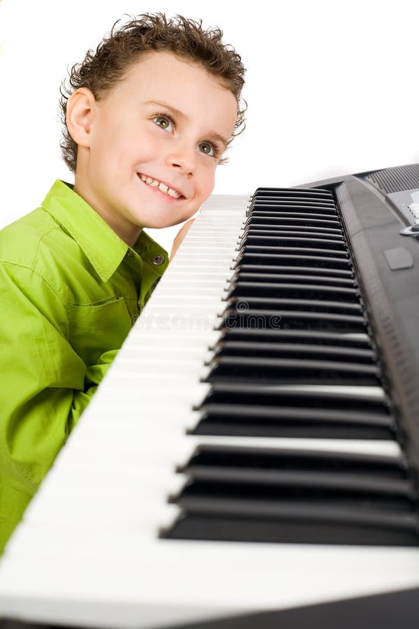 Cute kid playing piano stock photo. Image of little, cool - 7833916
