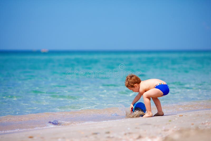 Cute Kid Playing on the Sea Beach Stock Image - Image of leisure, baby ...