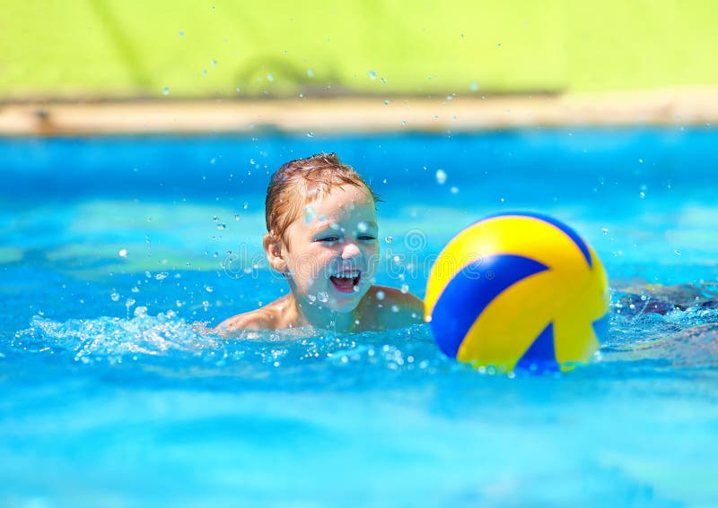 Cute Kid Playing Water Sport Games in Pool Stock Image - Image of ...