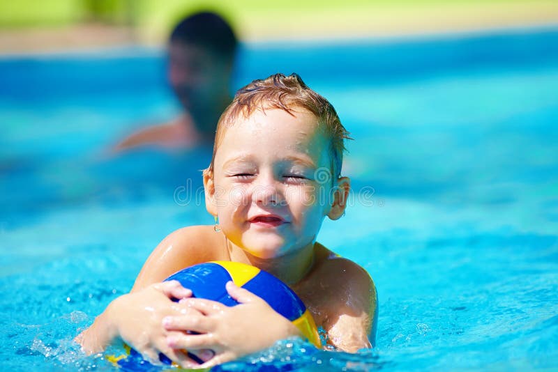 Boy playing water stock photo. Image of aquatic, playing - 142321654