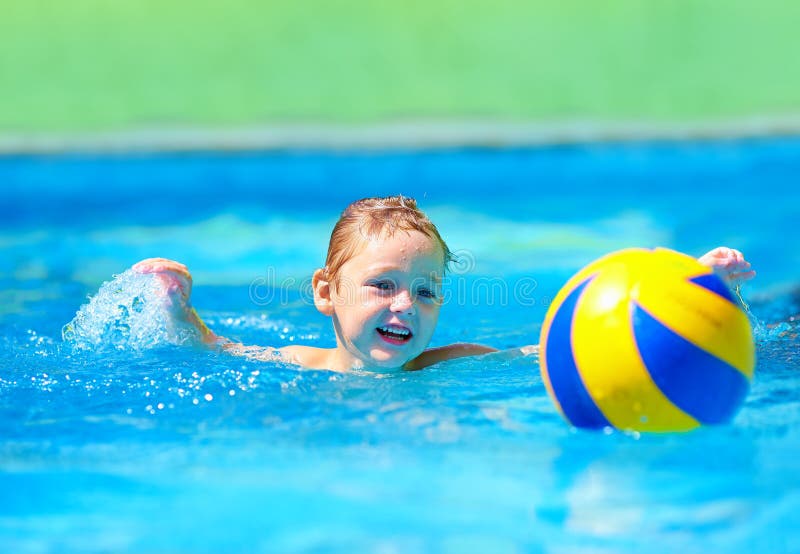 Cute Kid Playing Water Sport Games in Pool Stock Photo - Image of enjoy ...