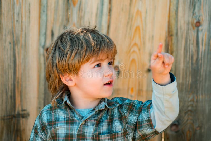 Cute Kid Pointing Up. Learning and Discovering. Happy Childhood. Spring ...