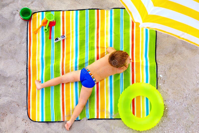 Happy Kid Sunbathing on Colorful Beach Stock Image - Image of delight ...