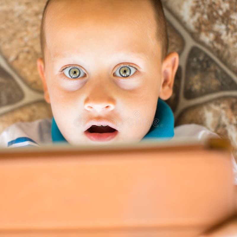 Cute kid with Tablet stock image. Image of happiness - 67310619